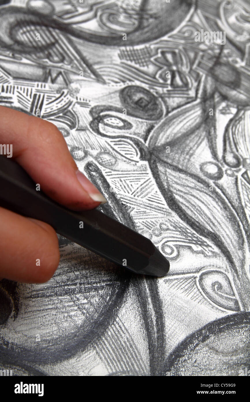 Artist at work sketching Stock Photo - Alamy