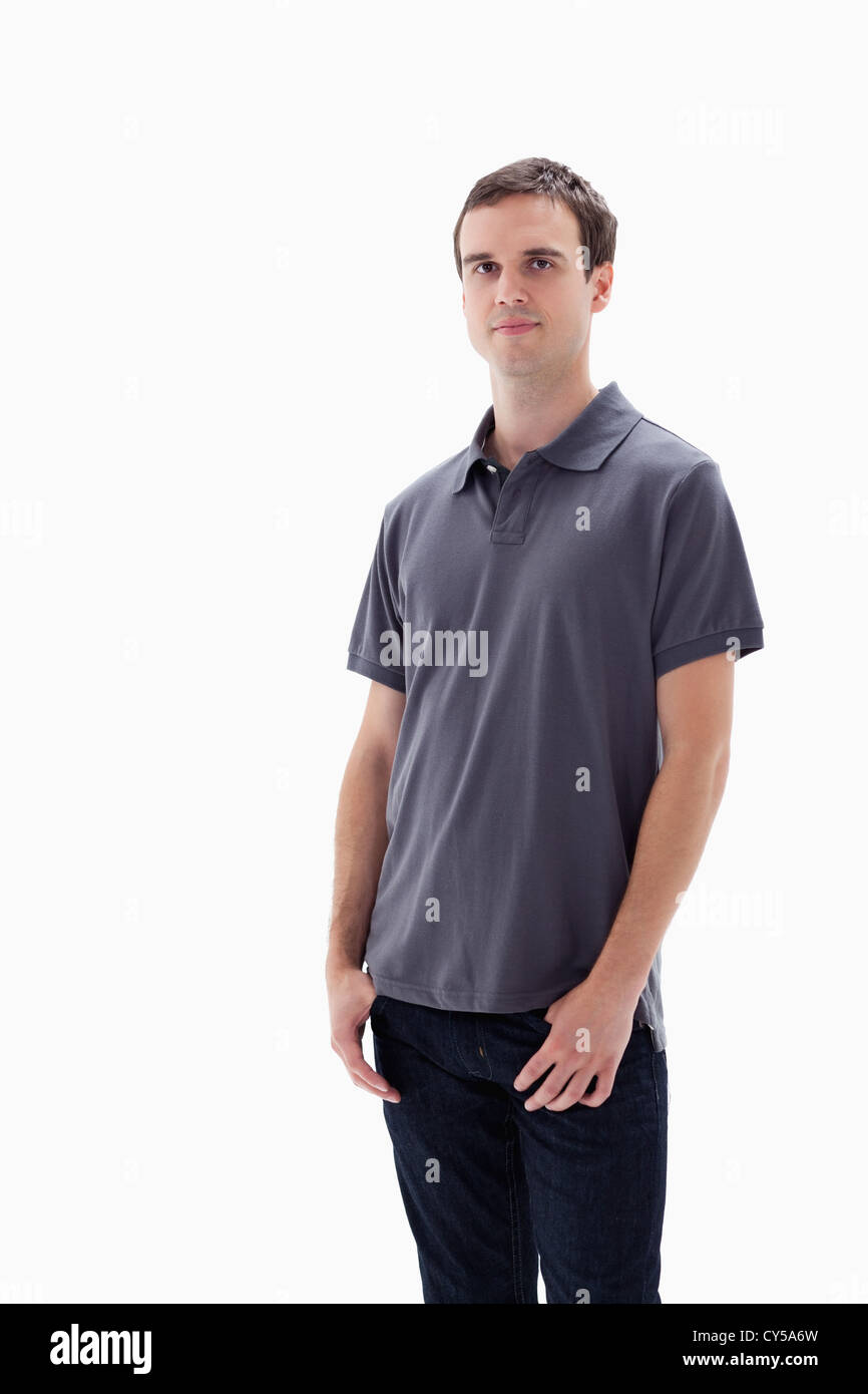 A standing man is looking at camera Stock Photo - Alamy