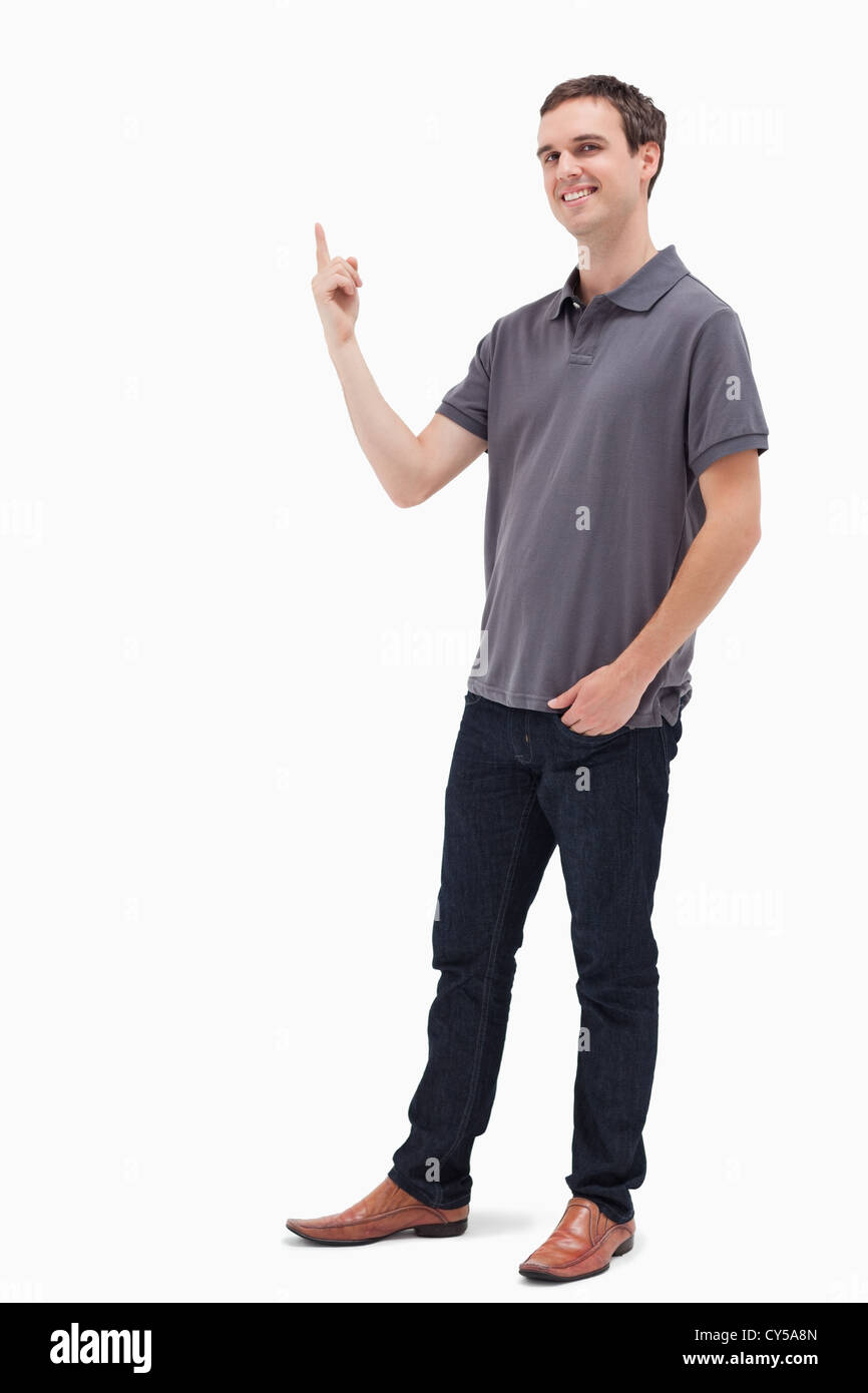 Happy man is pointing up Stock Photo - Alamy