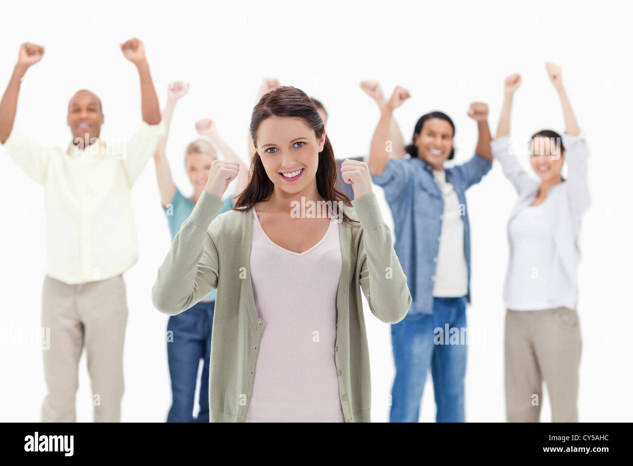 Happy people raising their arms Stock Photo - Alamy