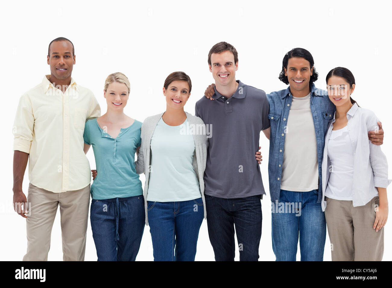 People smiling with arms around each other Stock Photo - Alamy