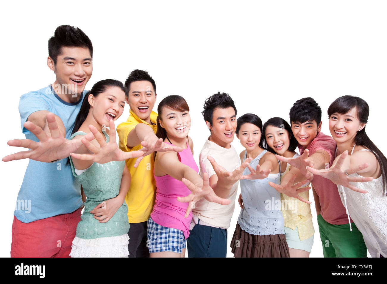 Young people stretching out hands Stock Photo - Alamy