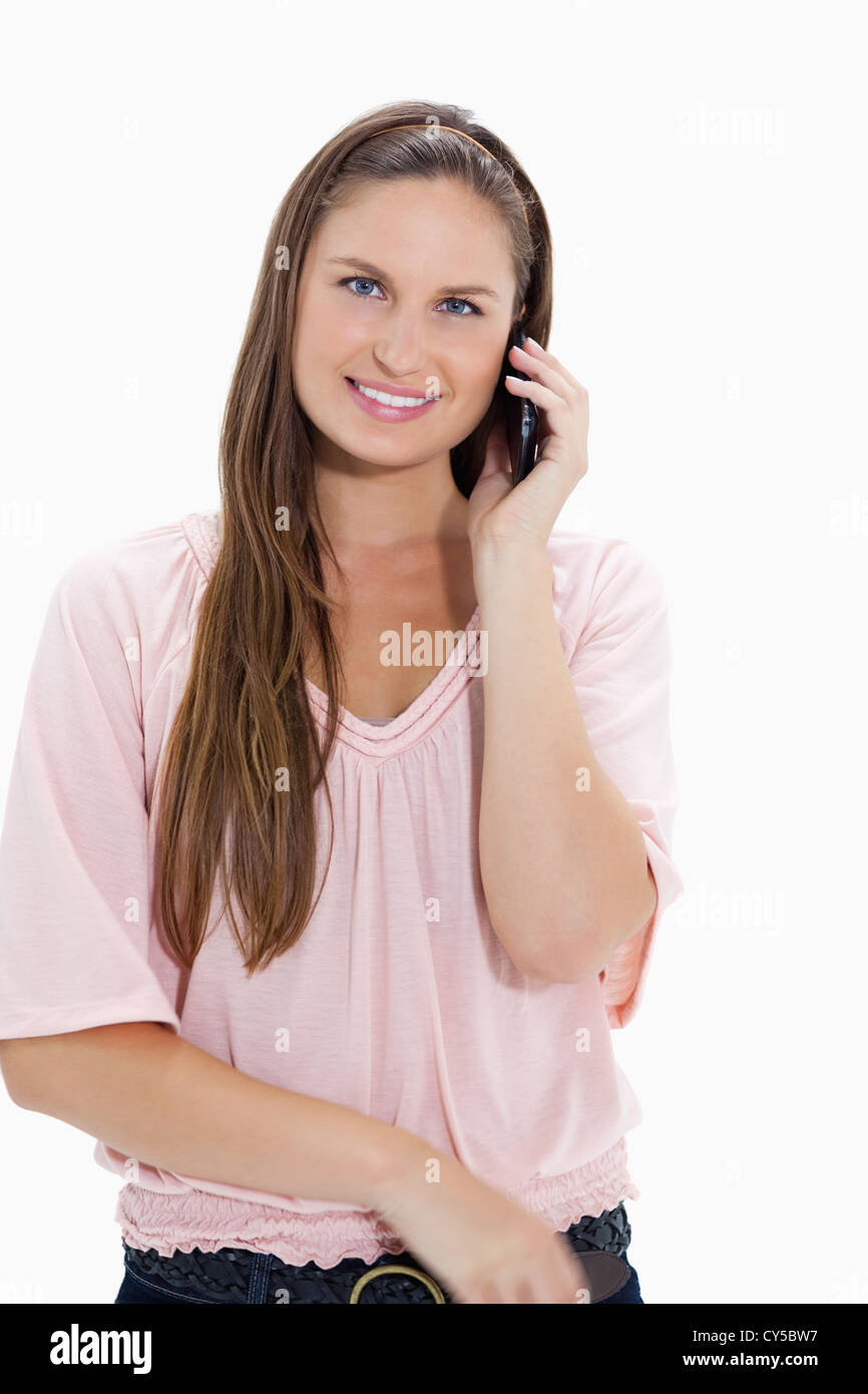 A young woman using a mobile phone Stock Photo - Alamy