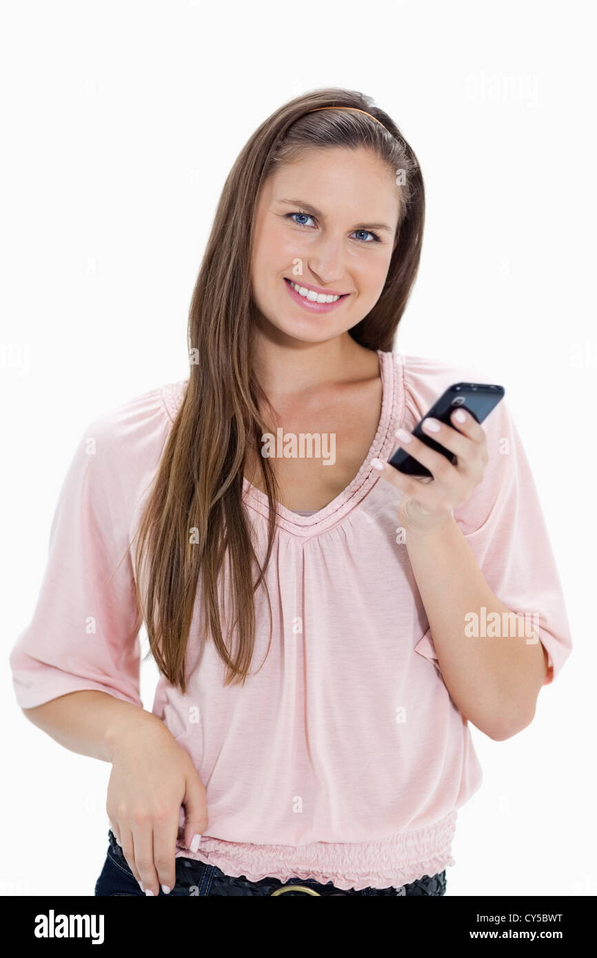 Woman is holding a mobile phone Stock Photo - Alamy