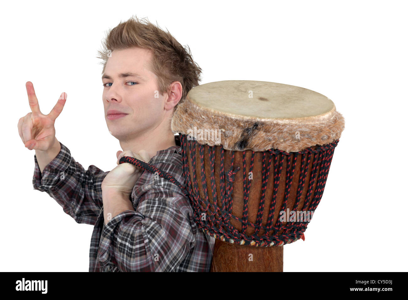 Man carrying bongo on back Stock Photo - Alamy