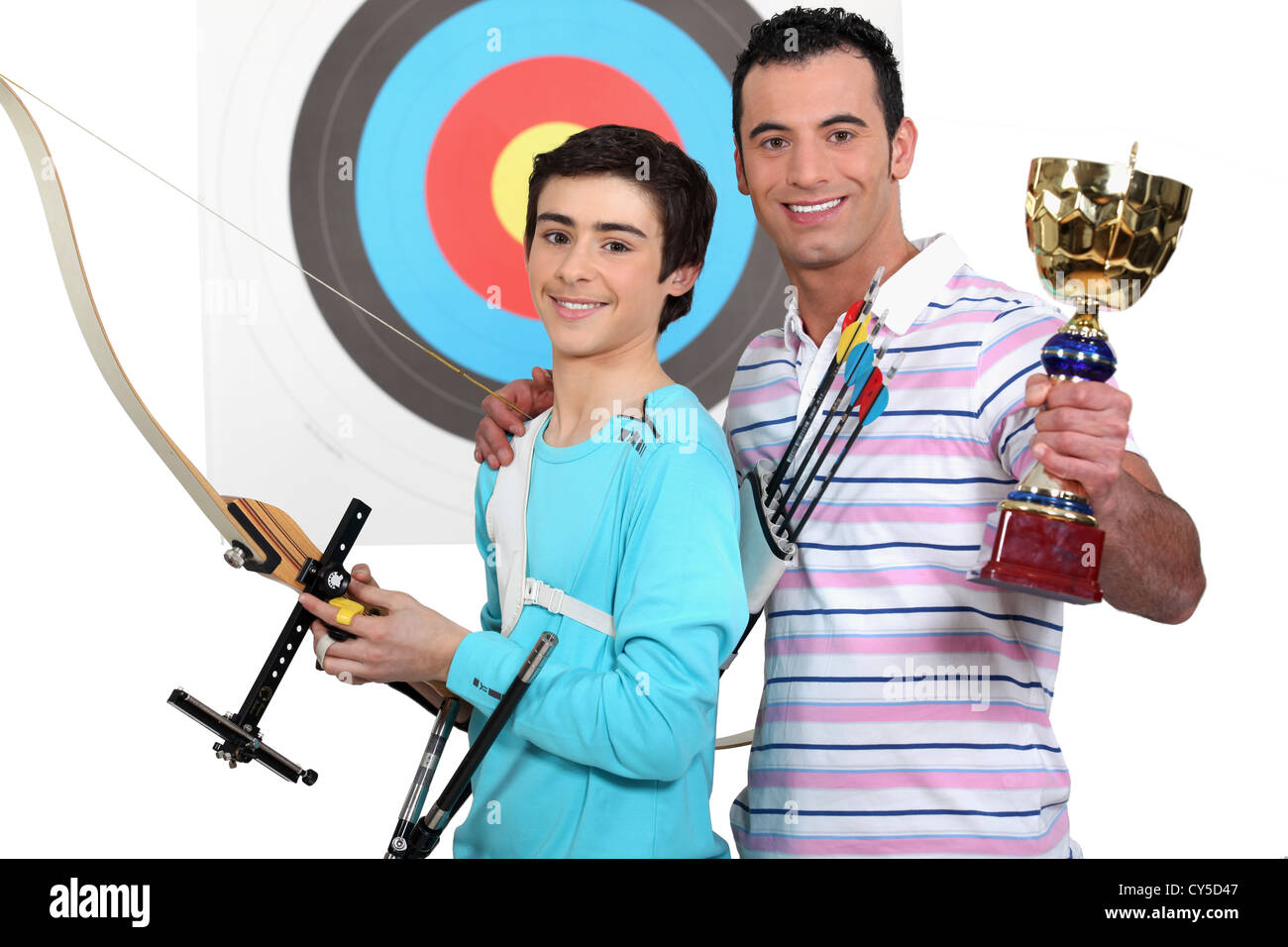 Father and son trophy and bow Stock Photo - Alamy