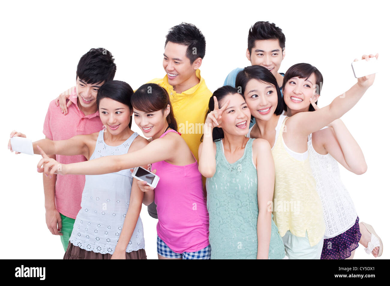 Group of young friends using mobile phones to do self portrait Stock ...