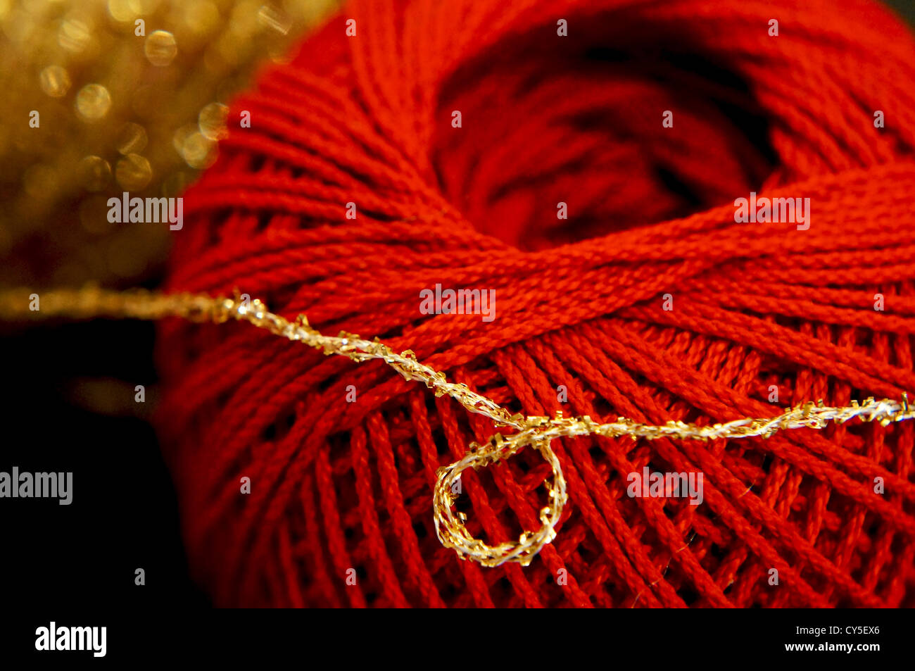 Golden yarn hi-res stock photography and images - Alamy