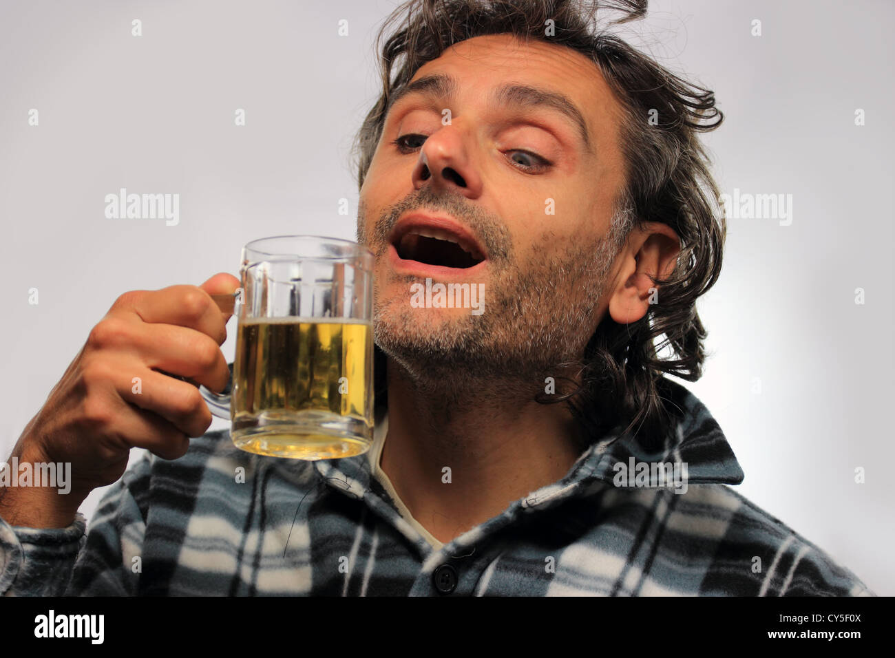 funny unshaven man drinking beer Stock Photo - Alamy