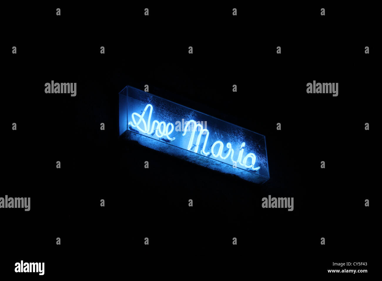 blue neon ave maria sign outside church in rome italy at night Stock ...