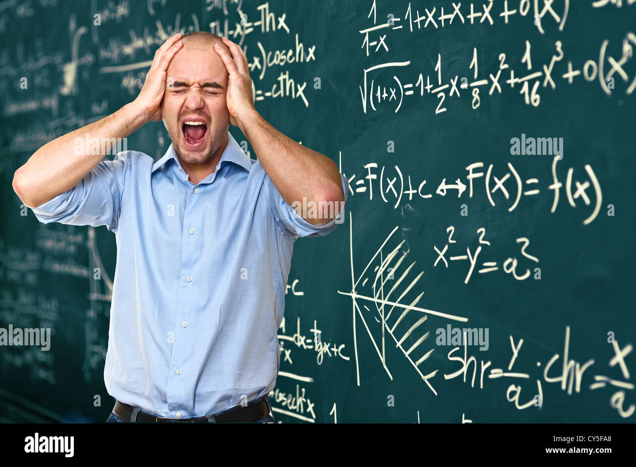 stressed man and blackboard background Stock Photo - Alamy