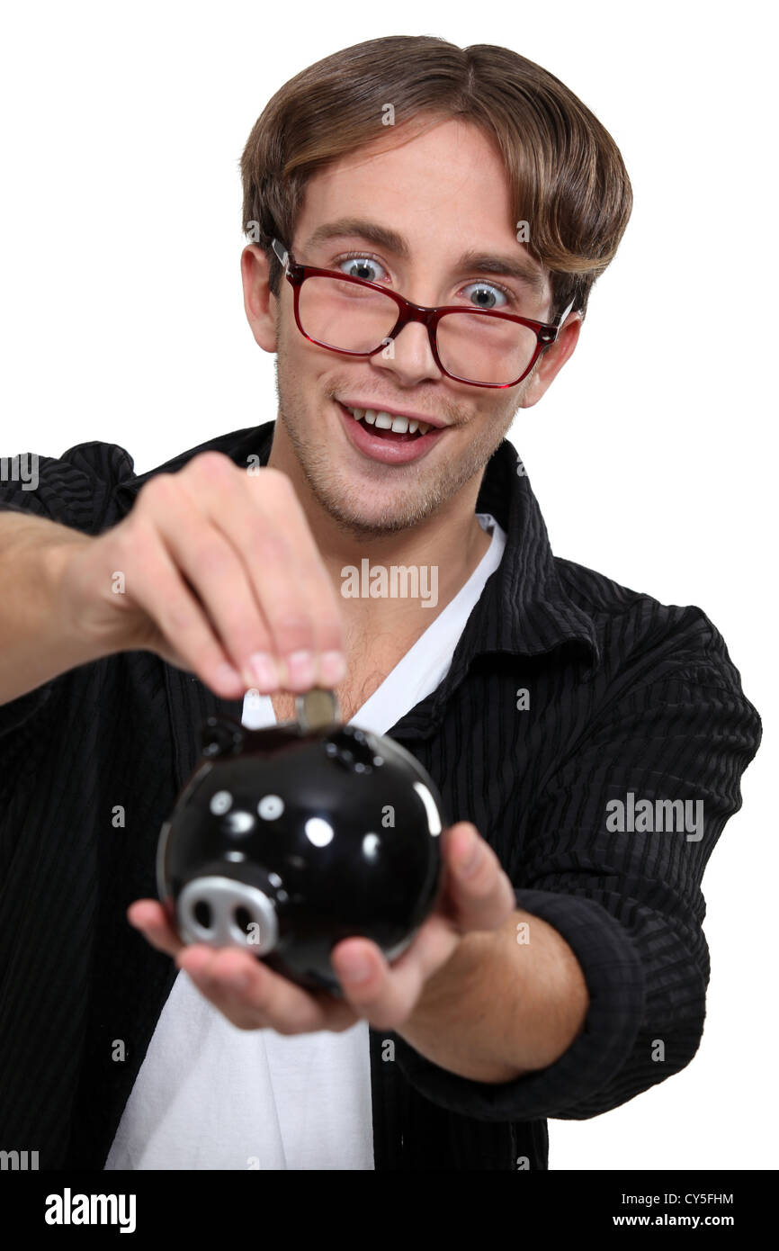 Geeky man saving money Stock Photo - Alamy
