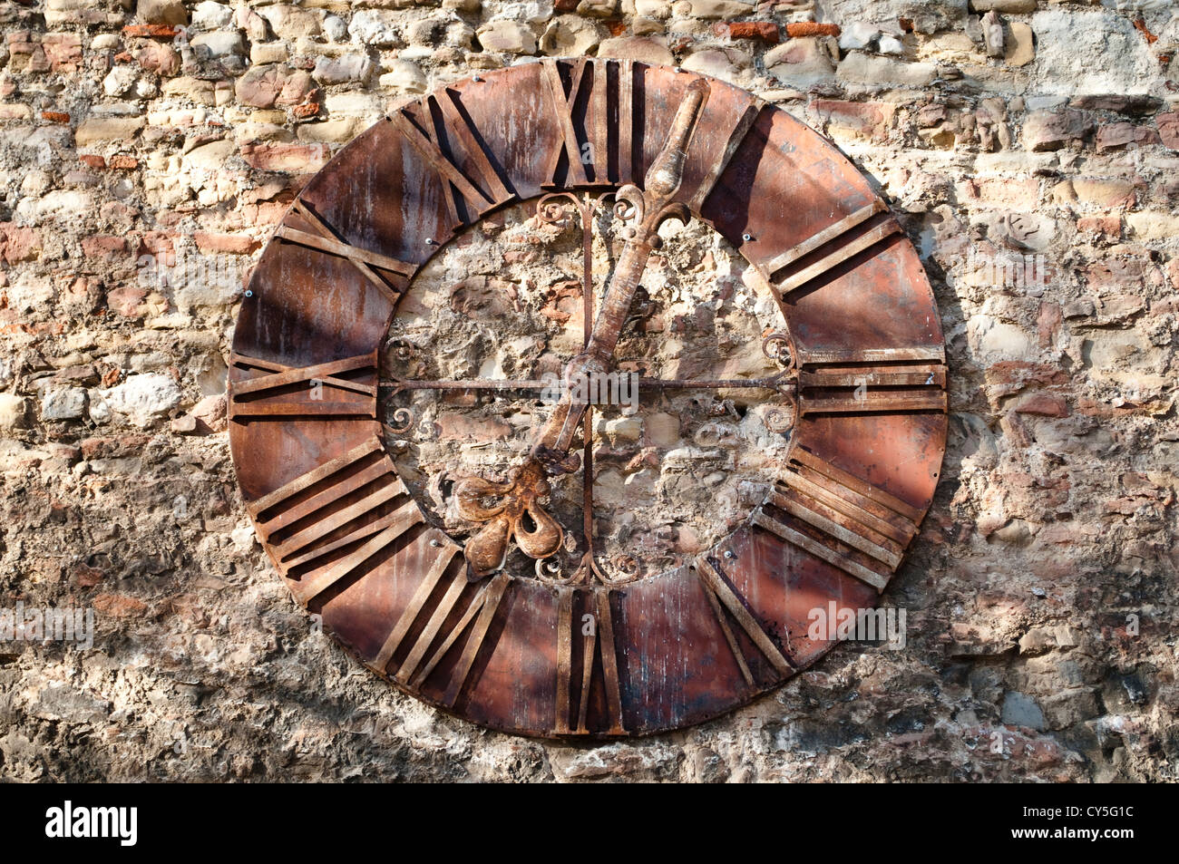 Rusty old clock with Roman numerals showing the right time, Kaptol ...