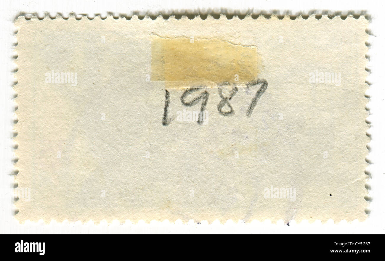 The reverse side of a postage stamp Stock Photo - Alamy