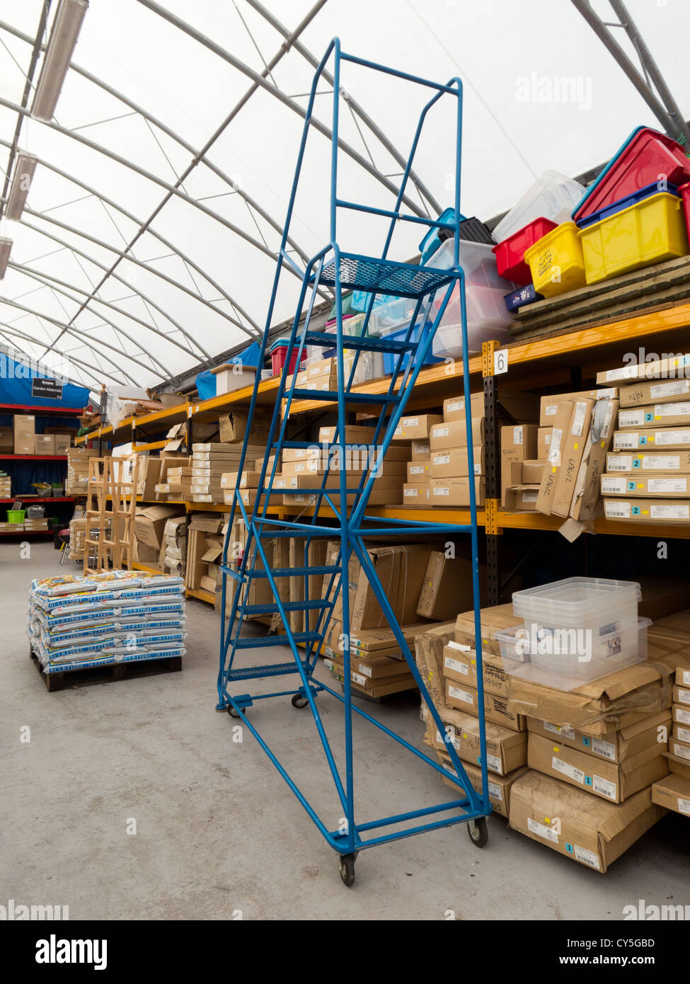 Warehouse ladder steps for workiing at height Stock Photo - Alamy