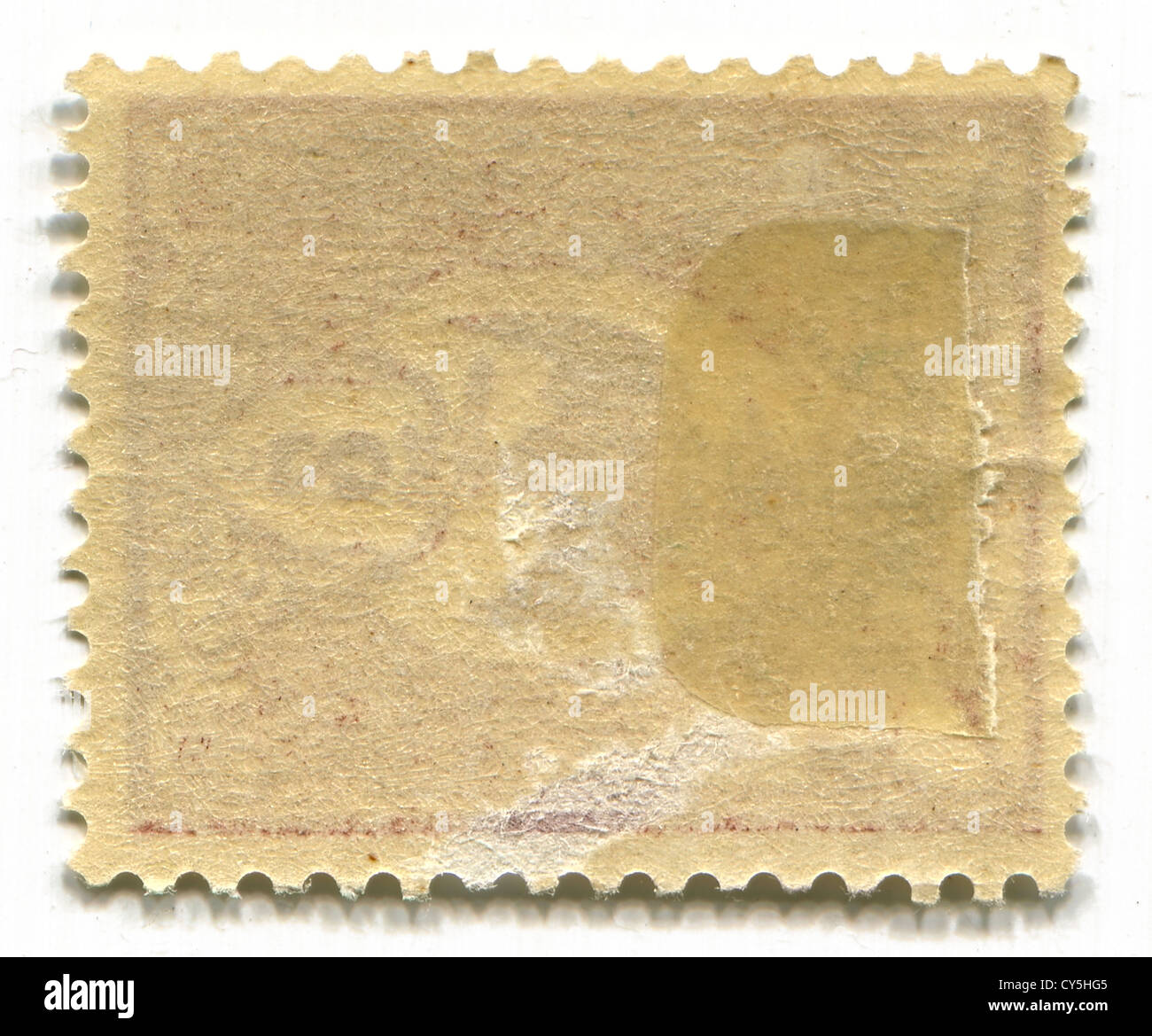 The reverse side of a postage stamp Stock Photo - Alamy