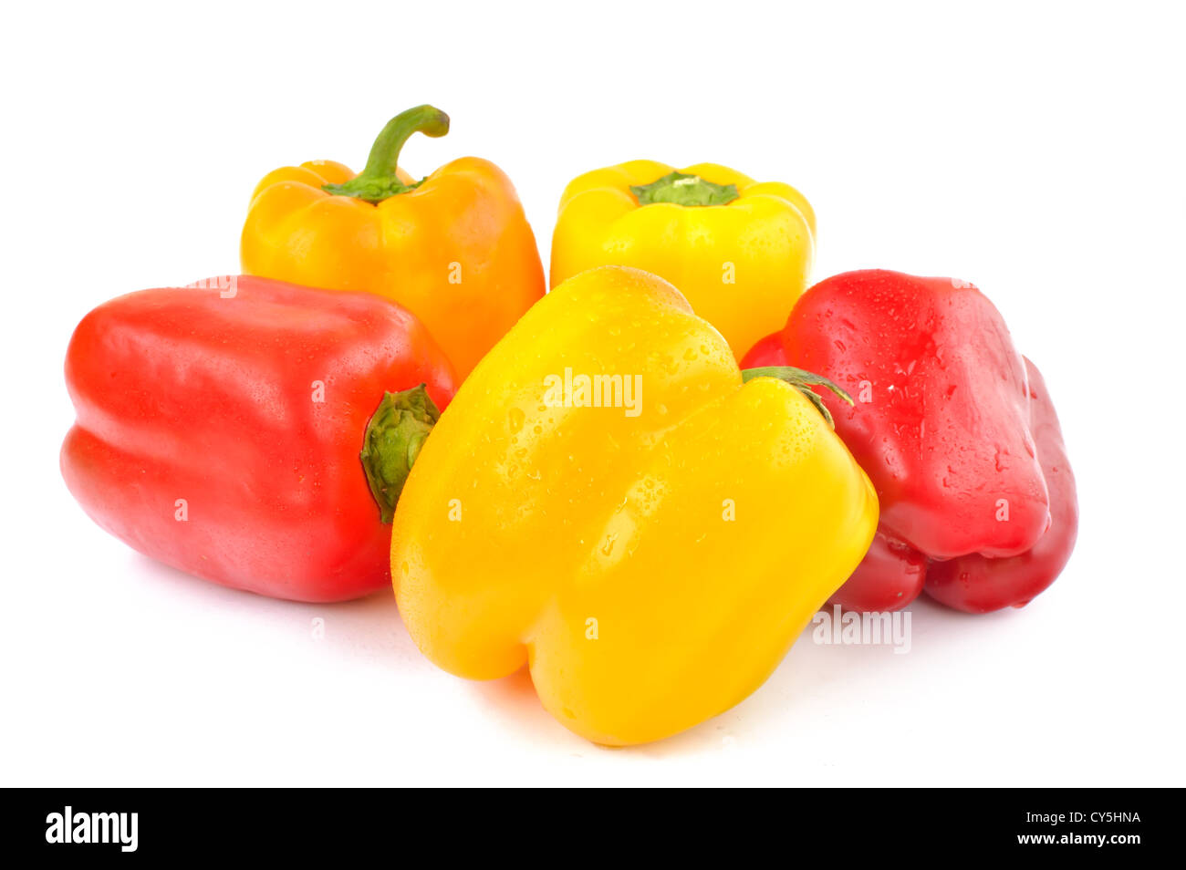 Multi-colored peppers on a white background, close-up Stock Photo - Alamy