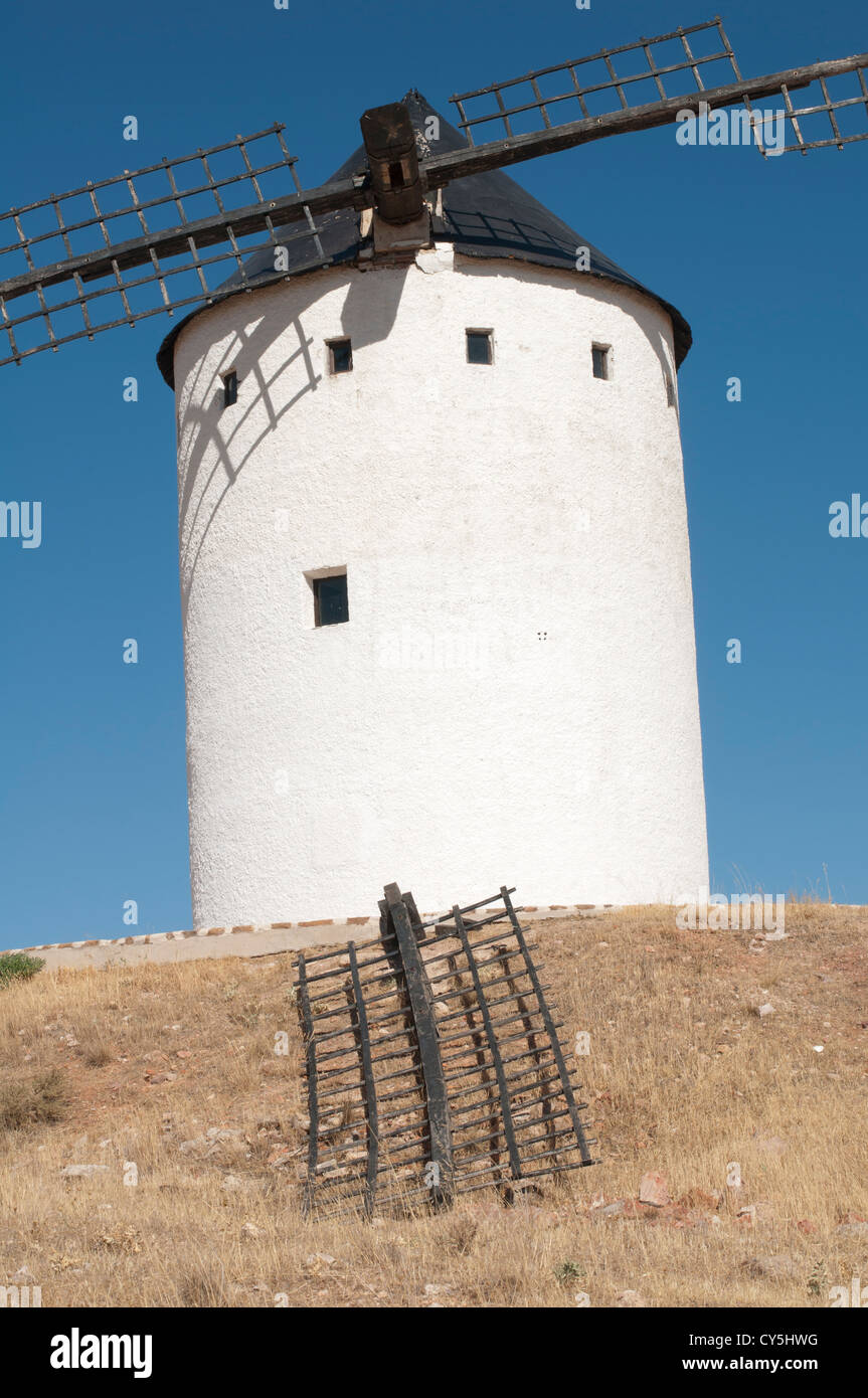 White ancient windmill. Blue sky background Stock Photo - Alamy