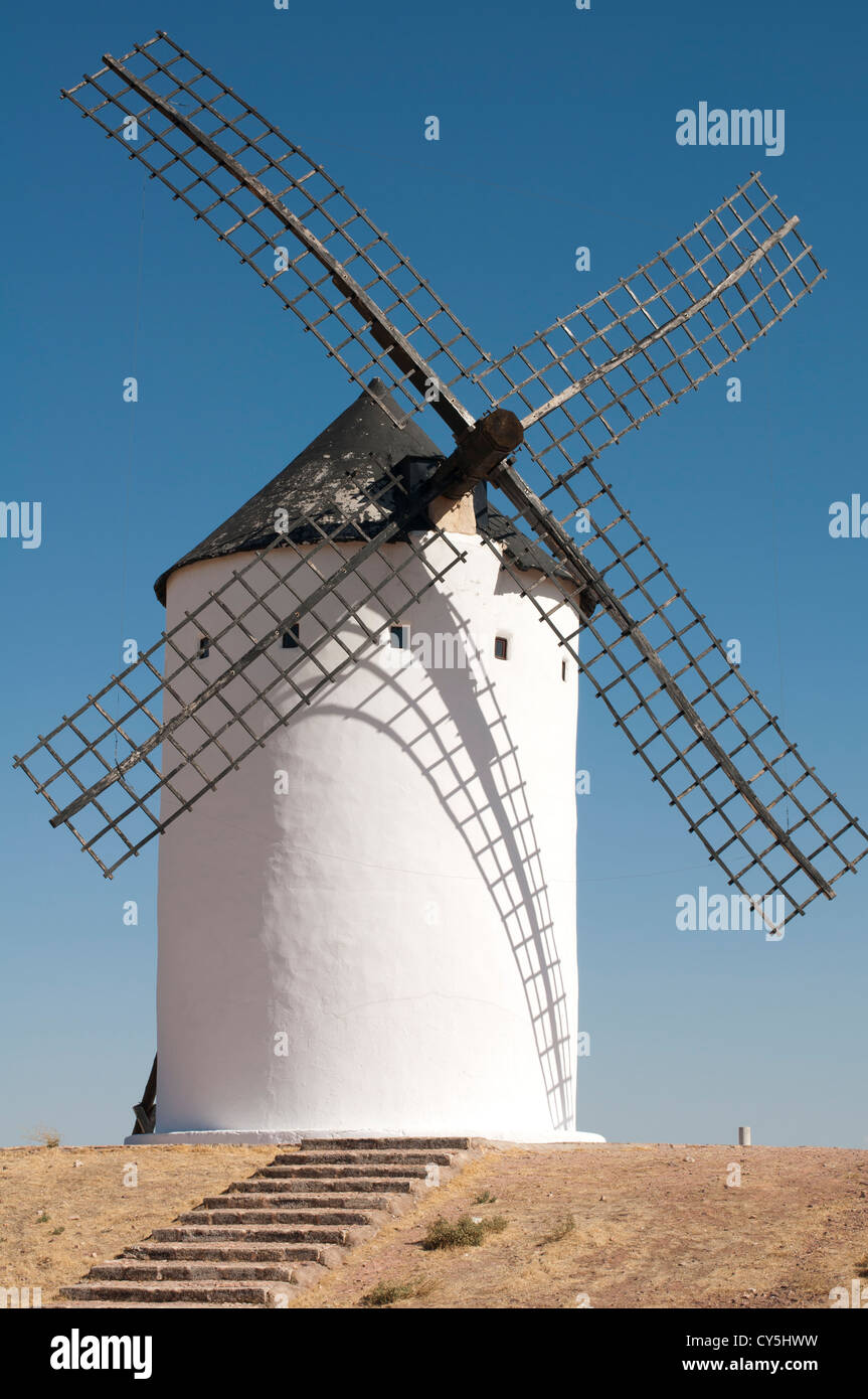 White ancient windmill. Blue sky background Stock Photo - Alamy
