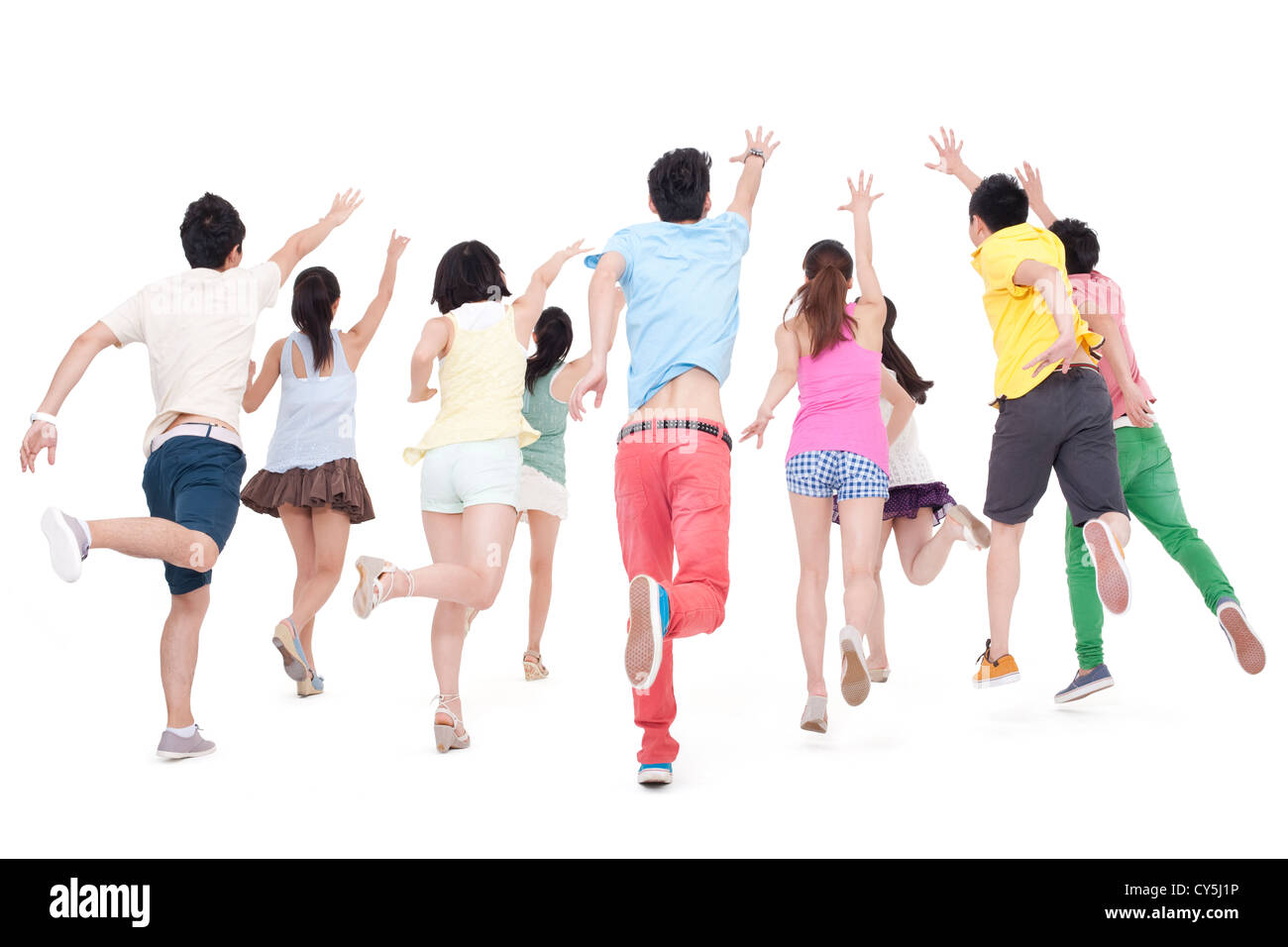 Excited young people jumping Stock Photo - Alamy