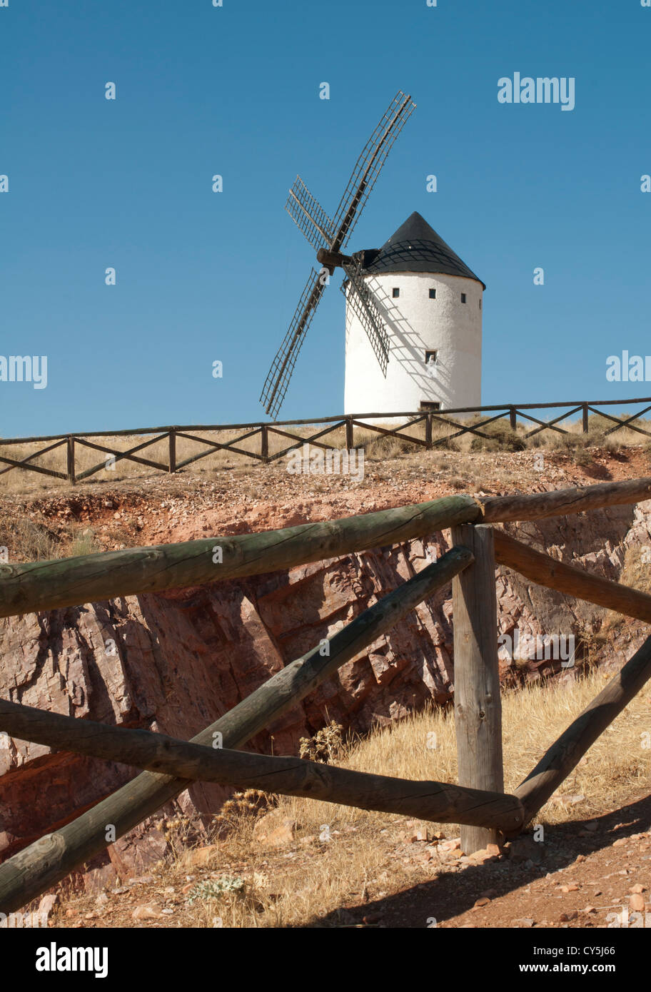 White ancient windmill. Blue sky background Stock Photo - Alamy