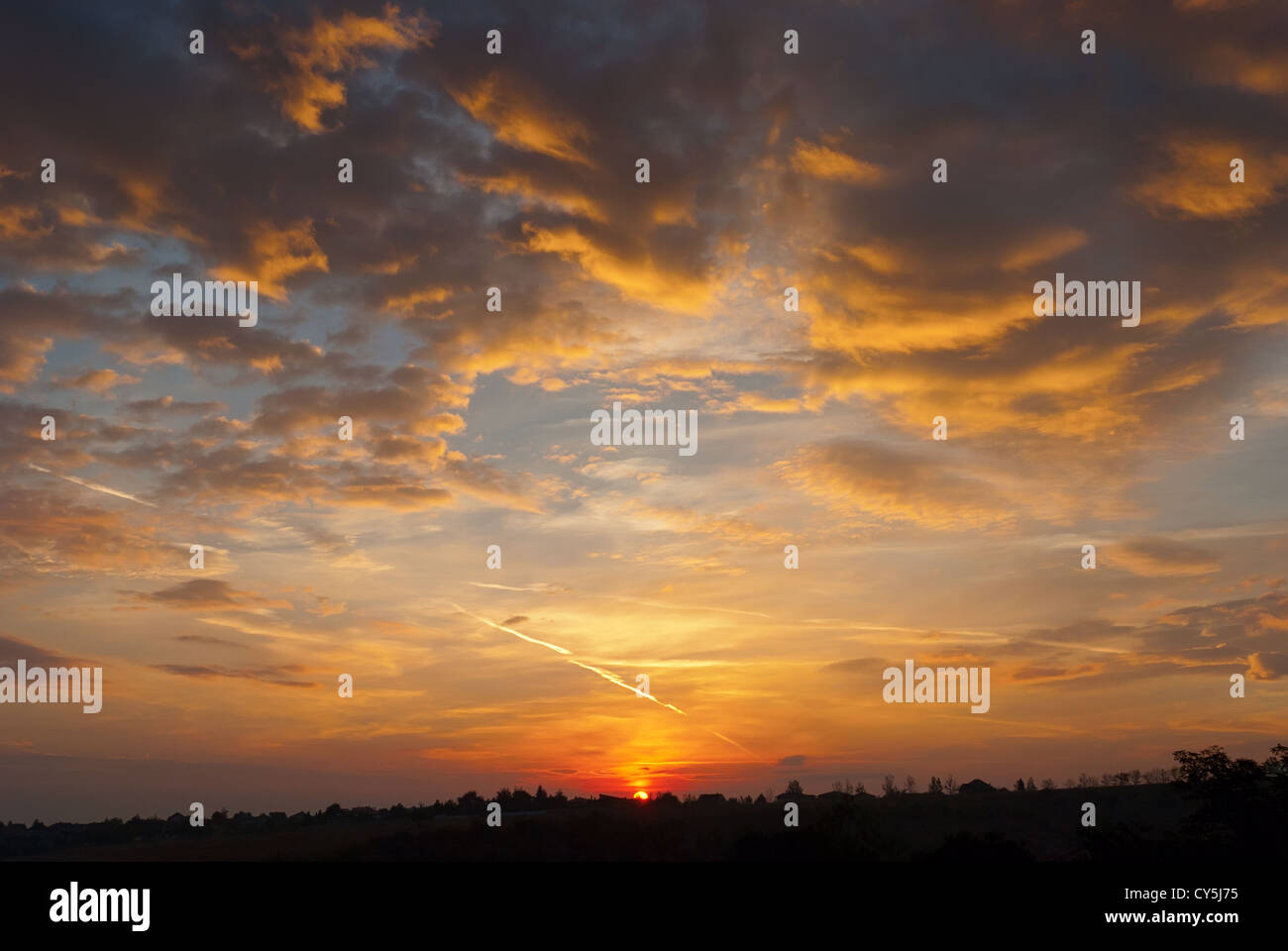 Sunrise background in warm colours Stock Photo - Alamy