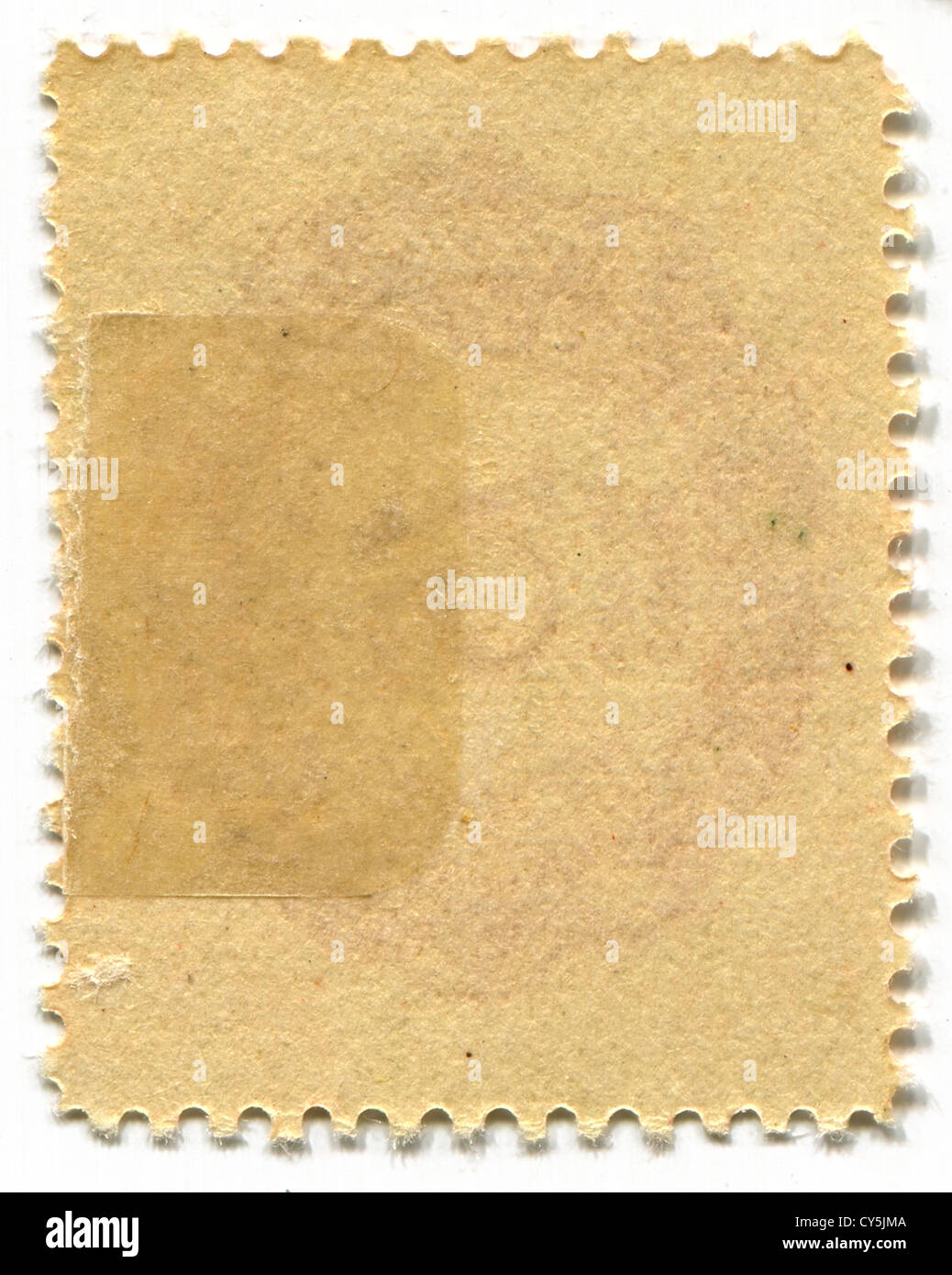 The reverse side of a postage stamp Stock Photo - Alamy