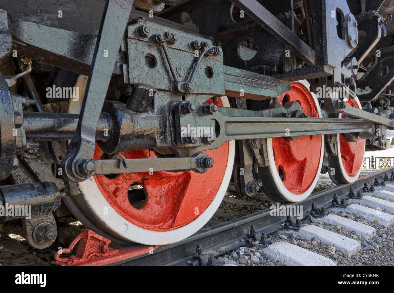 Wheels and connecting rod of old steam locomotive Stock Photo - Alamy