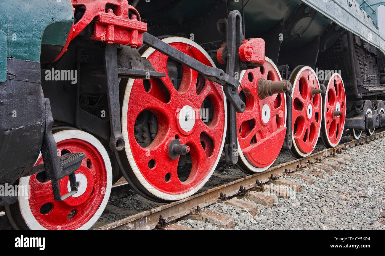 Wheels and connecting rod of old steam locomotive Stock Photo - Alamy