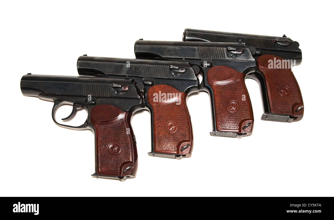 Four pistols on white background Stock Photo - Alamy