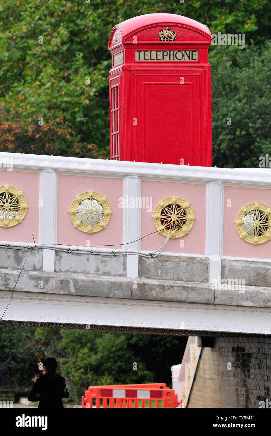 London, England, UK. Albert Bridge and traditional red telephone box ...