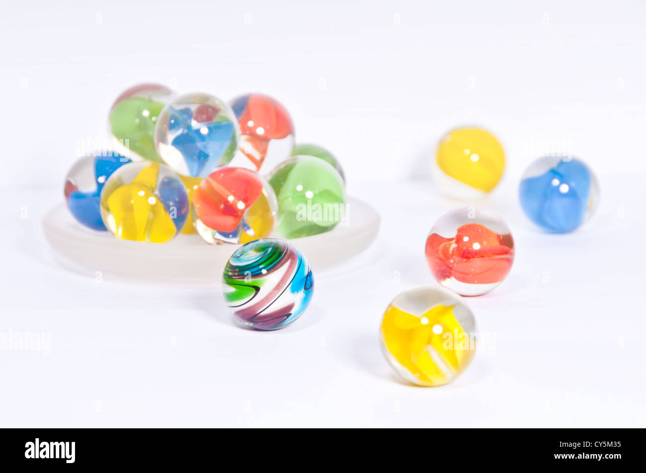 Collection of Glass Marbles on a white background Stock Photo - Alamy