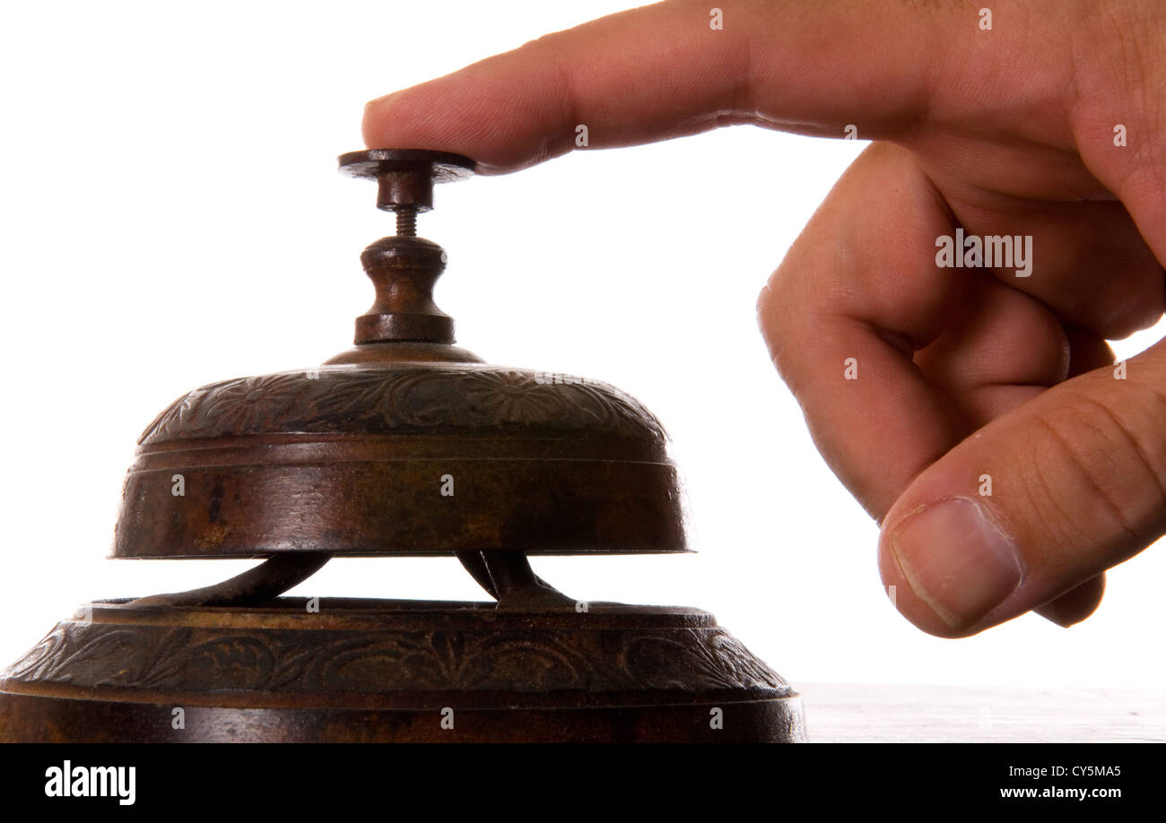 Antique service bell being rung against white background Stock Photo ...