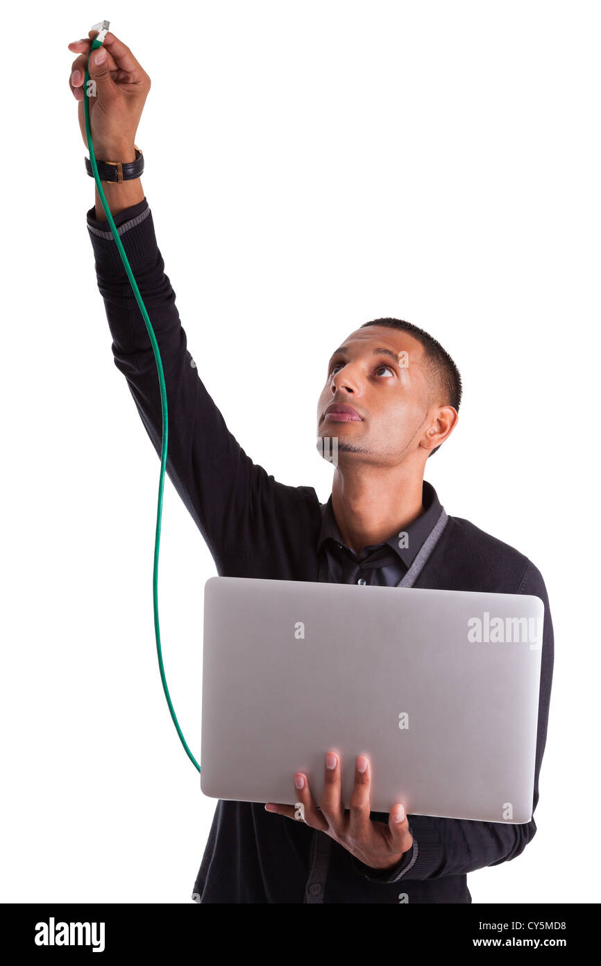 Young african american computer scientist plugin a ethernet cable ...
