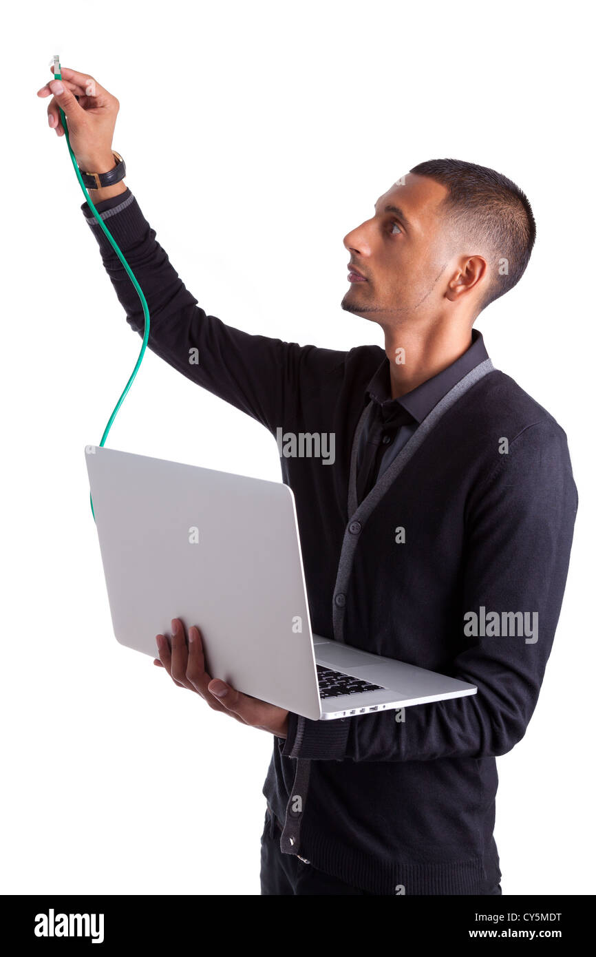 Young african american computer scientist plugin a ethernet cable ...