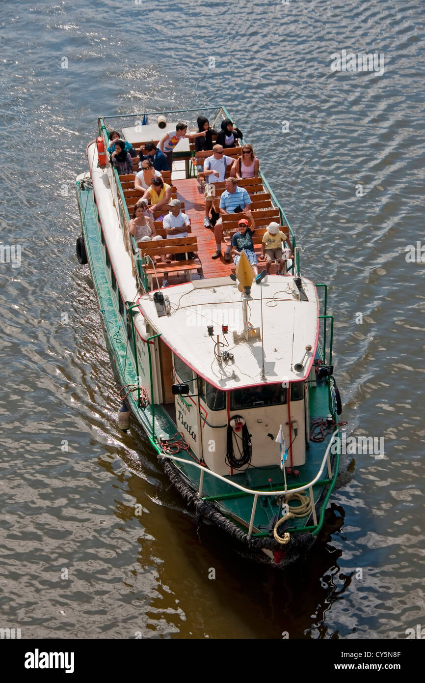 Prague boat tour on Vltava River Stock Photo - Alamy