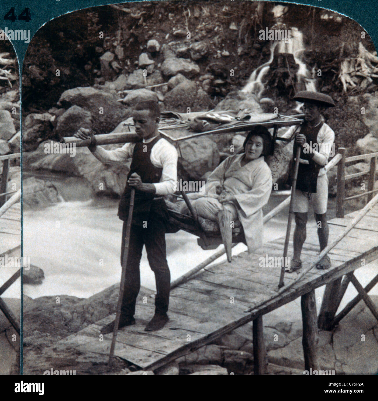 Japanese Woman Traveling in Mountain Chair (Yama-Kago) Over Daiya River ...