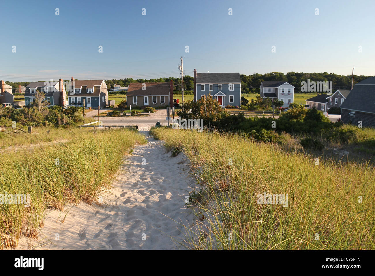 Homes seen from a path leading away from East Sandwich Beach, Cape Cod ...