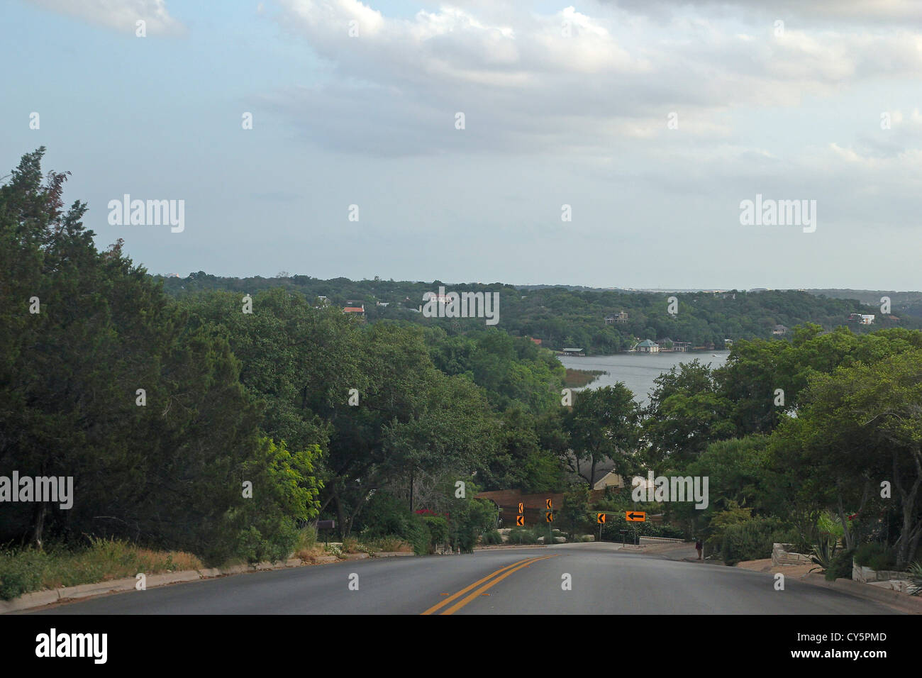 A curving road on a hill on the outskirts of Austin, Texas Stock Photo ...