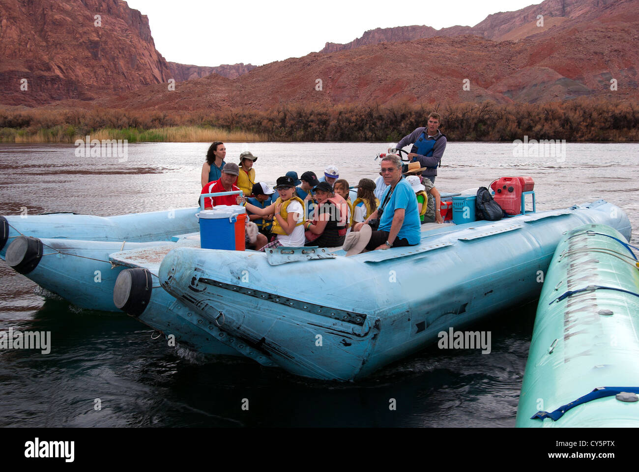 River raft with 15 passengers arrive at end of day trip on Colorado ...