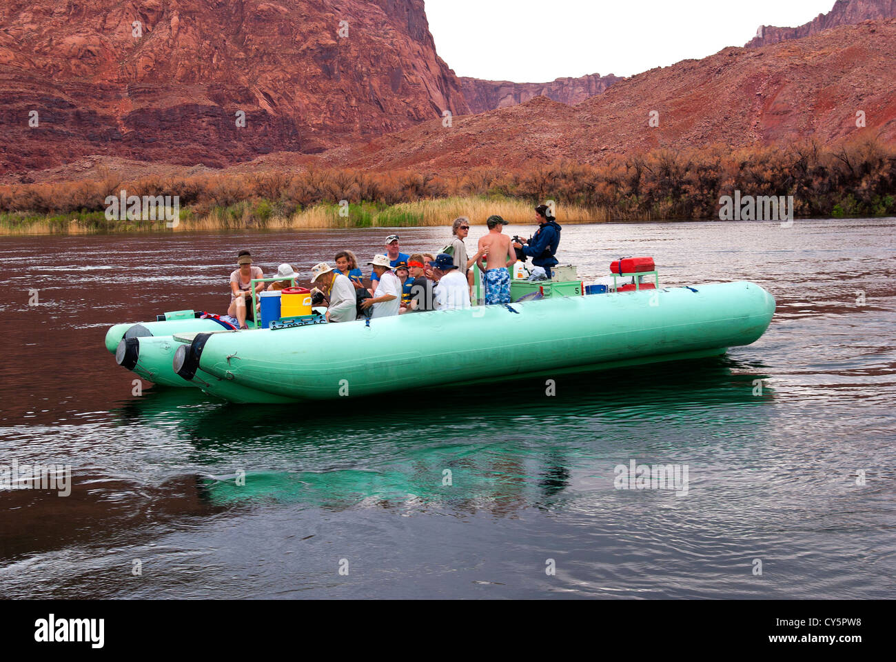 River raft with 13 passengers arrive at end of day trip on Colorado ...