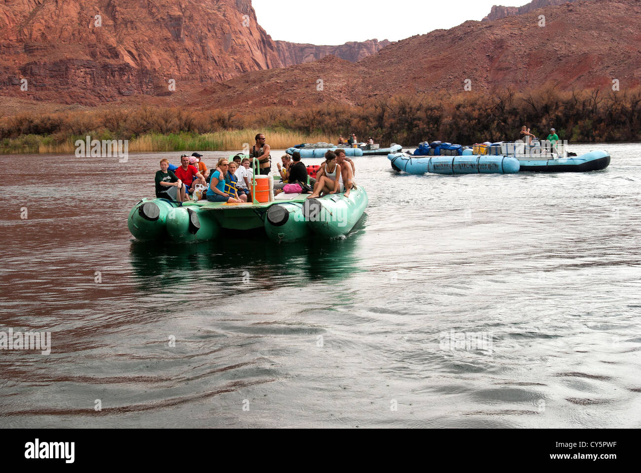 River raft with 13 passengers arrive at end of day trip on Colorado ...