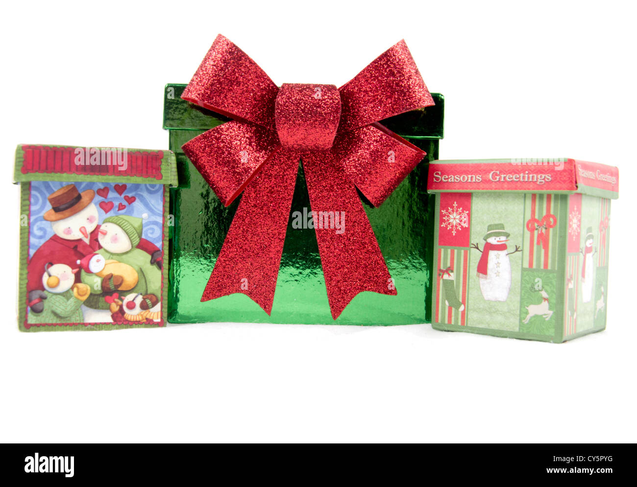 Boxed and decorated Christmas presents isolated on white background ...