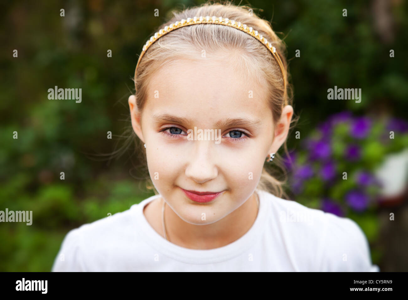 Portrait of caucasian girl on flower background Stock Photo - Alamy