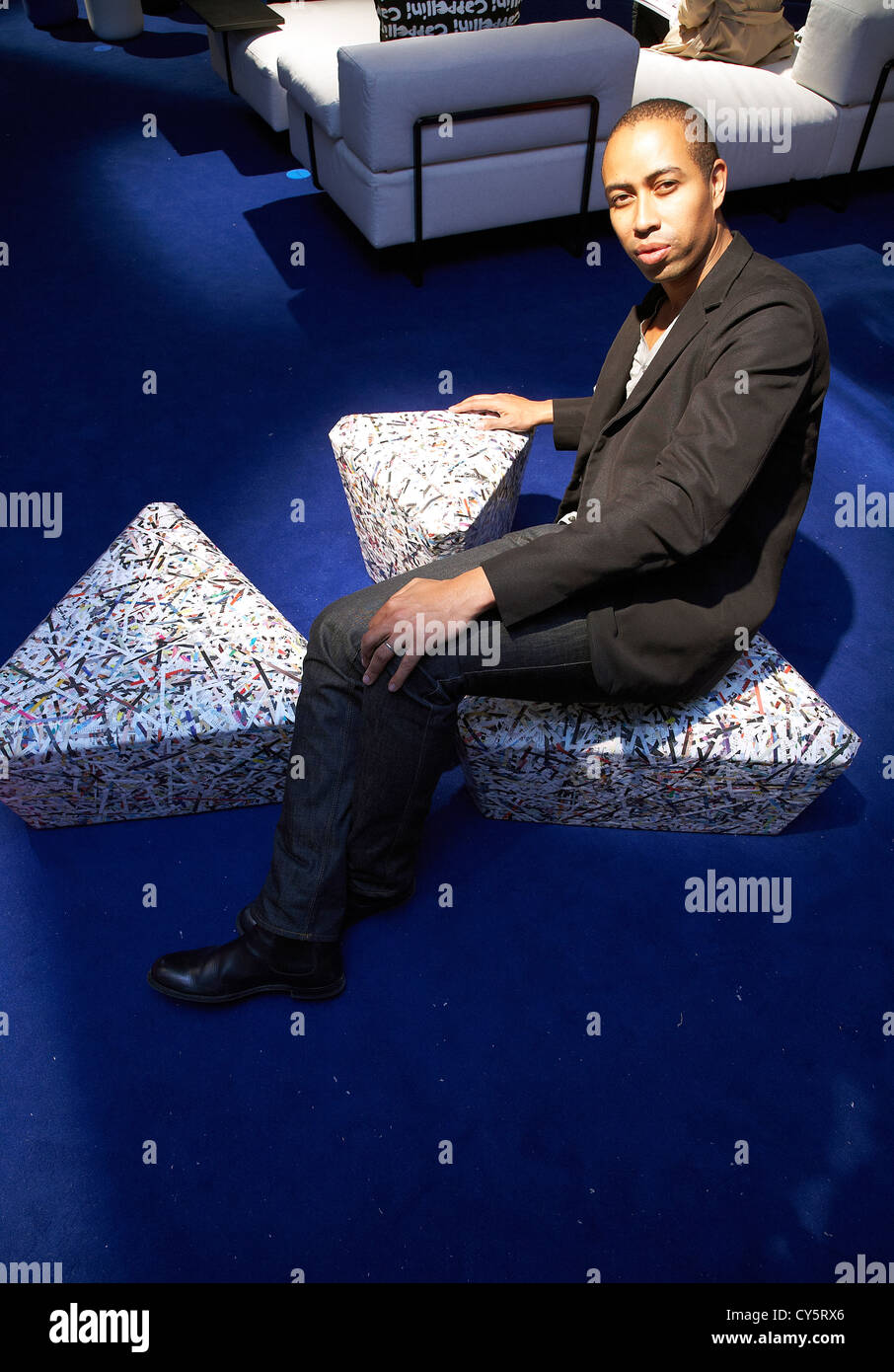 Designer Stephen Burks at Cappellini booth during Salone del Mobile ...