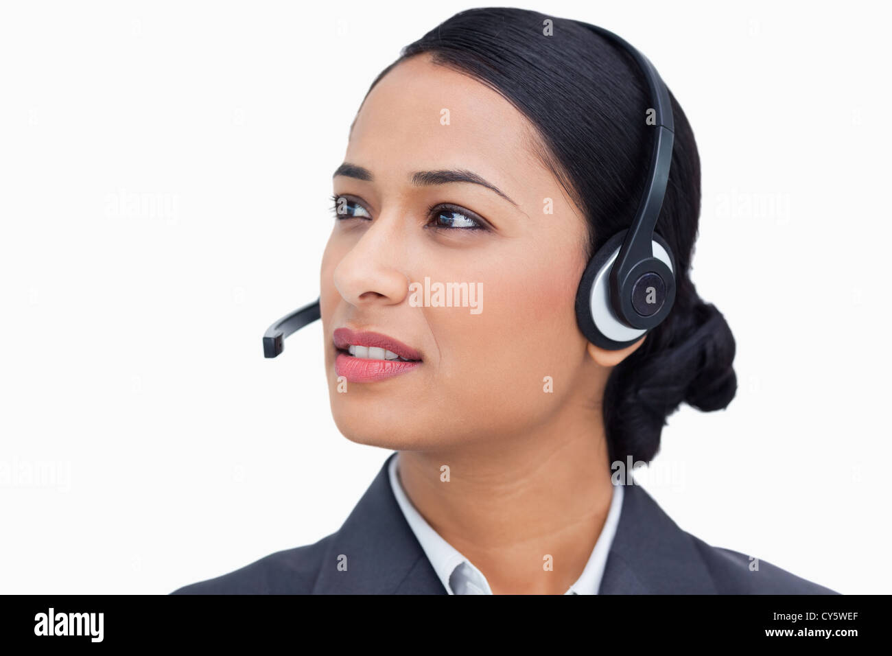 Close up of talking call center agent looking to the side Stock Photo ...