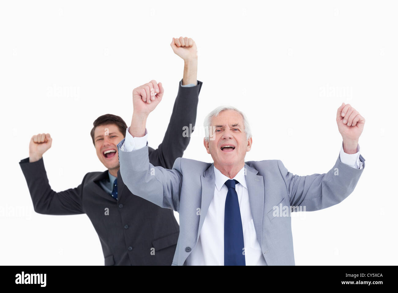 Close up of cheering businessmen Stock Photo - Alamy
