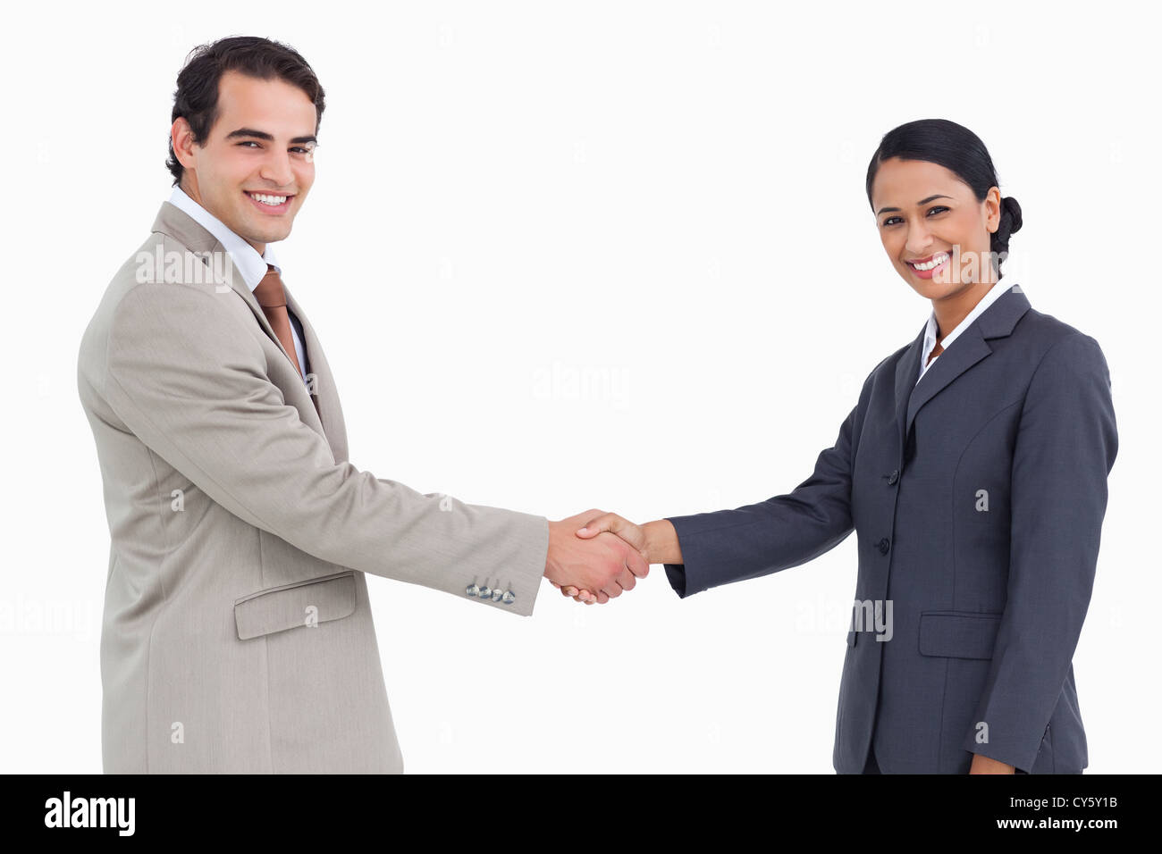 Smiling male employee handshake Cut Out Stock Images & Pictures - Alamy