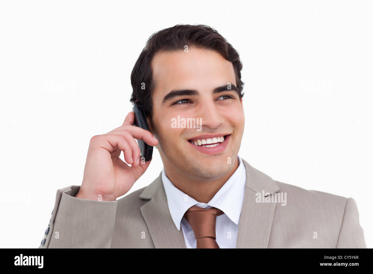 Close up of smiling salesman on his cellphone Stock Photo - Alamy