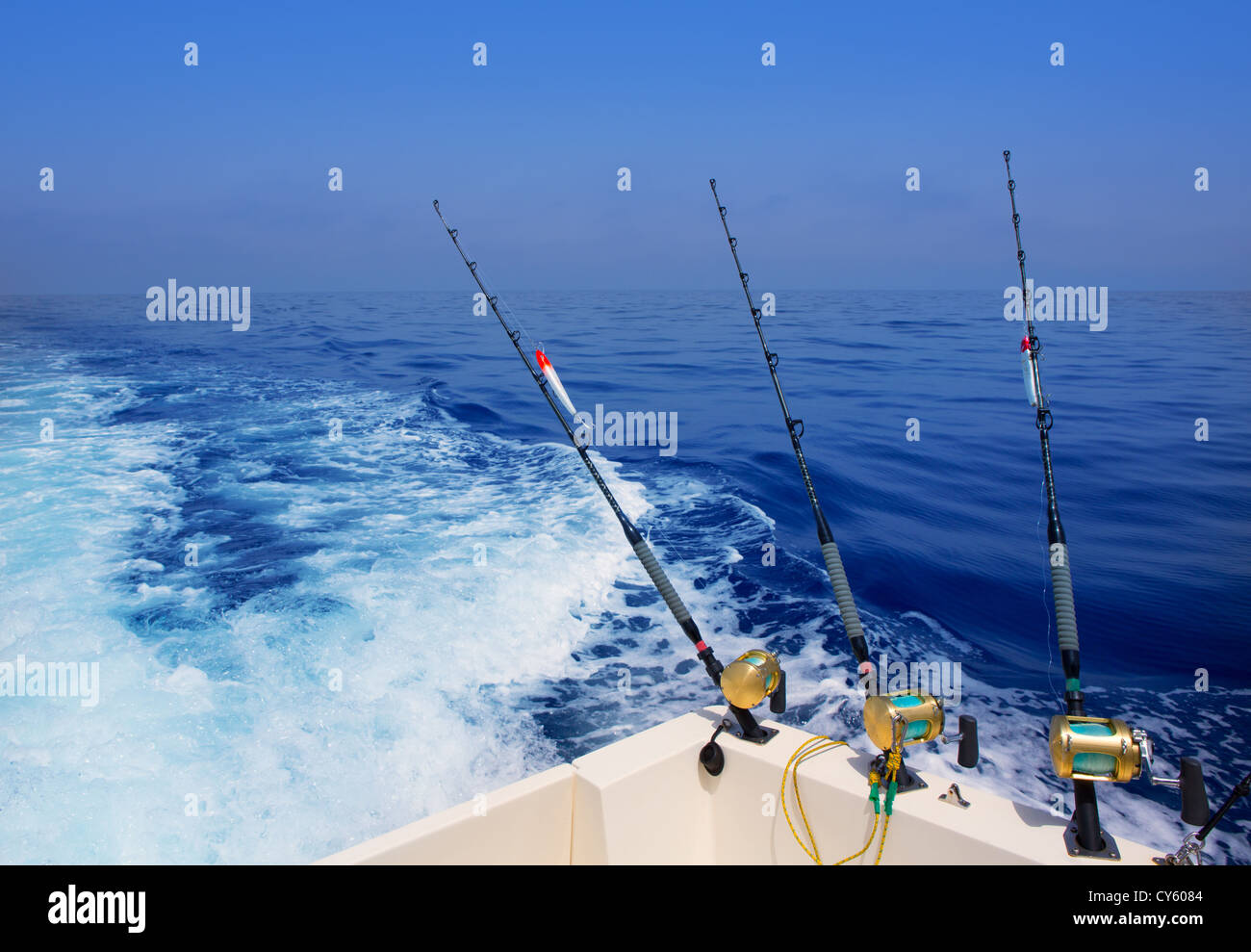 boat fishing trolling in deep blue ocean offshore in Mediterranean sea ...